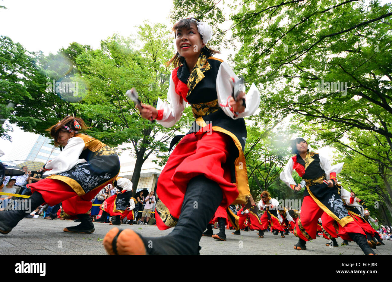 Tokyo, Japan. 23rd Aug, 2014. Participants in colorful costumes dance ...