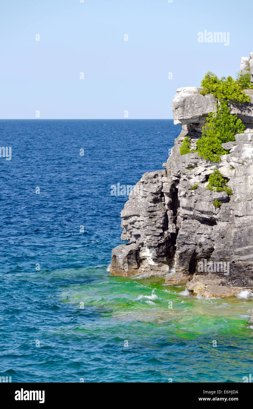 Green and blue water of Huron Lake, Ontario under blue sky Stock Photo ...