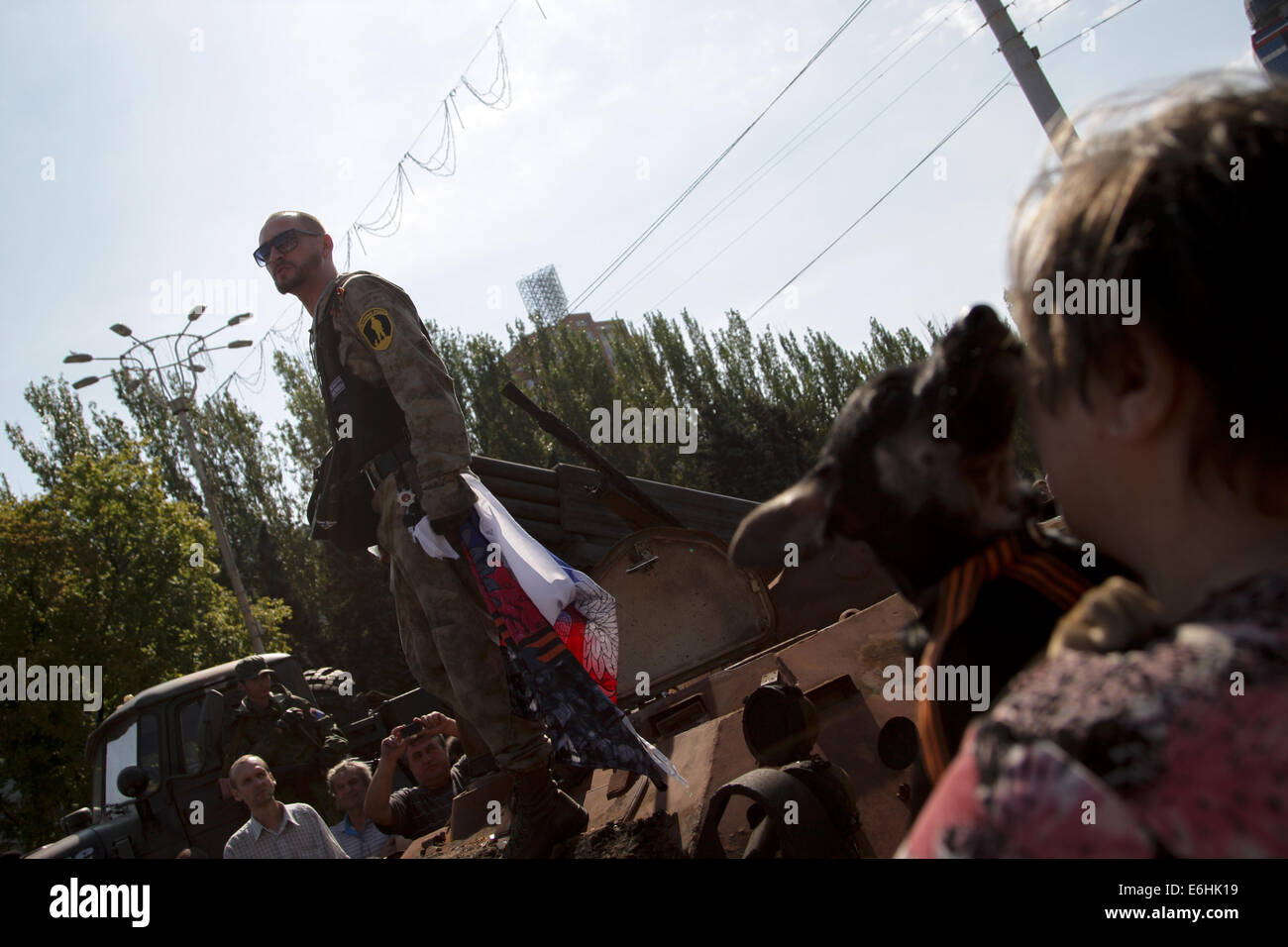 Donetsk, Ukraine. 24th Aug, 2014. A militia speaks during the parade in ...
