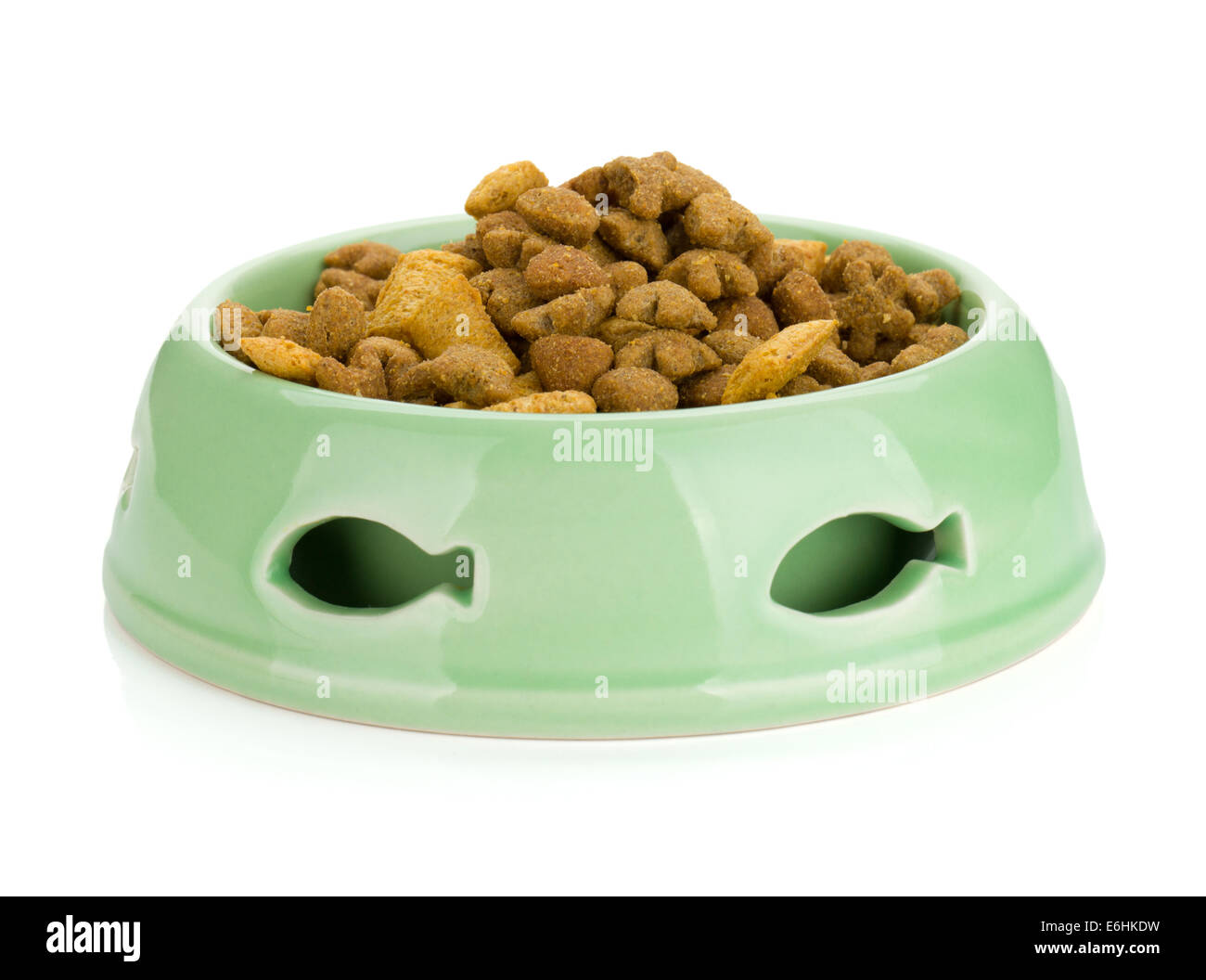 Cat food in a bowl. Isolated on white background Stock Photo - Alamy