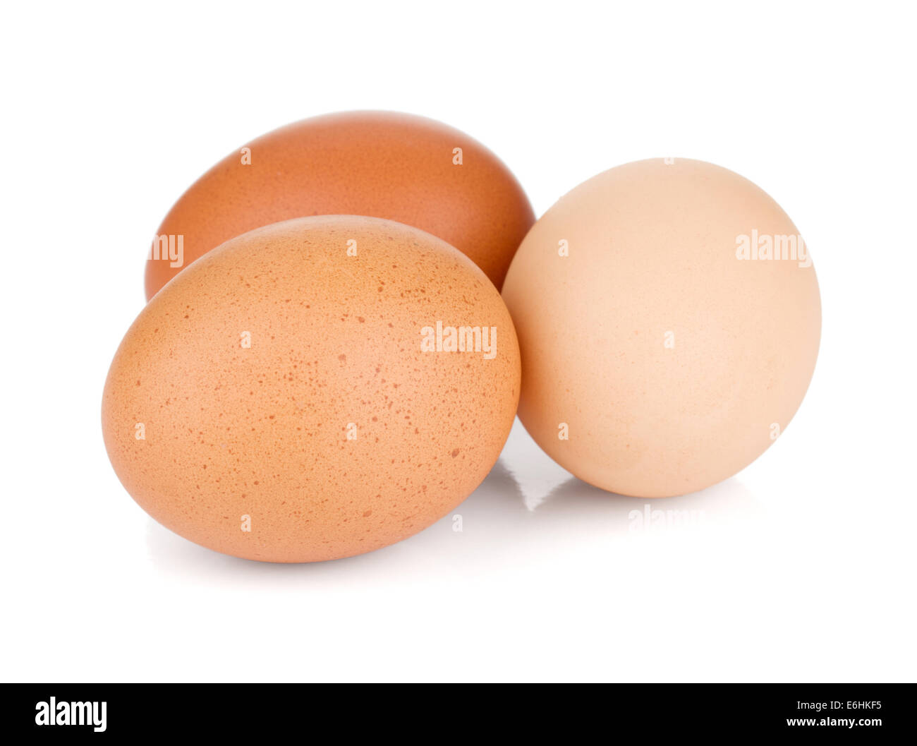 Three eggs. Isolated on white background Stock Photo - Alamy