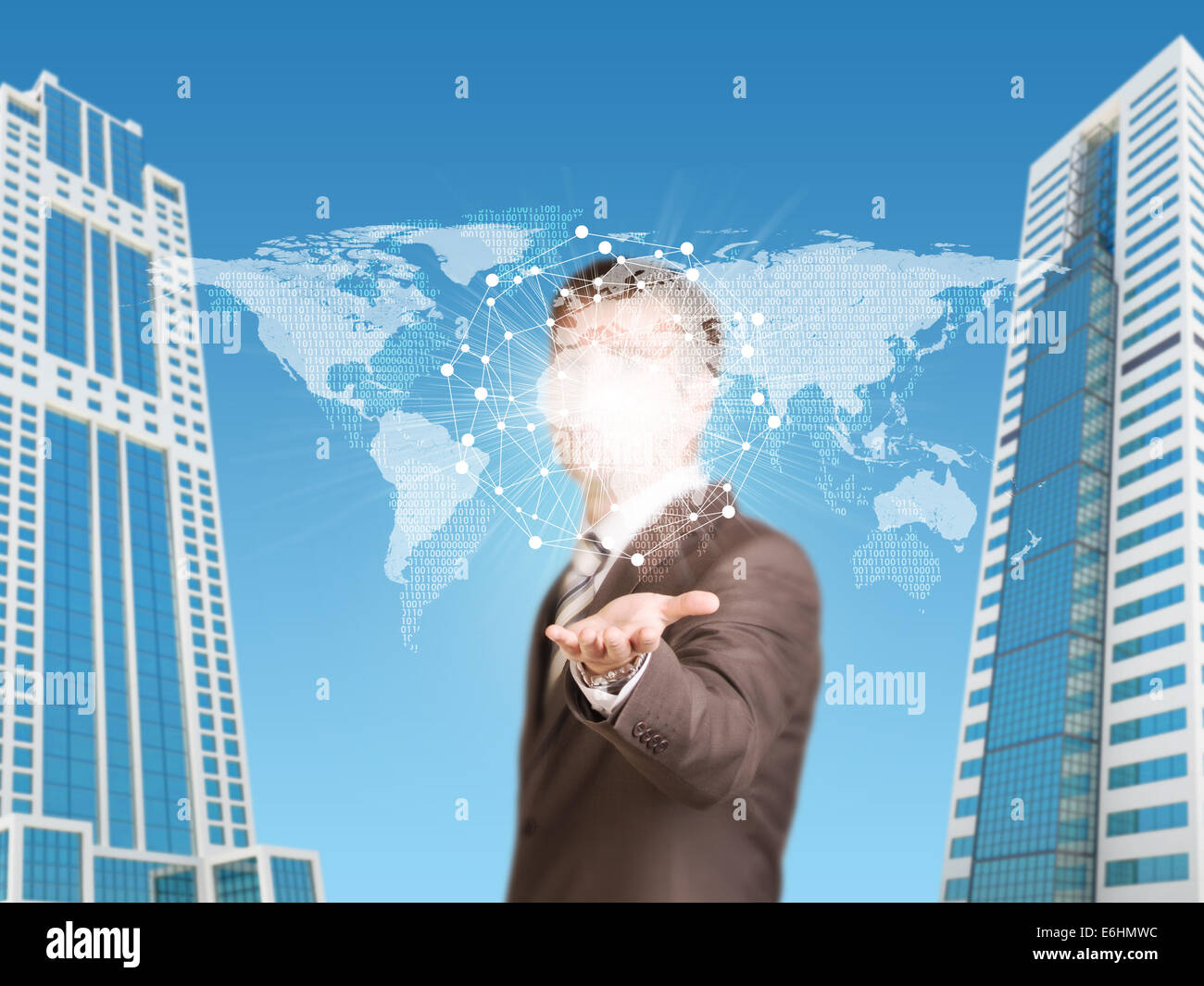 Businessman in a suit hold world map Stock Photo - Alamy