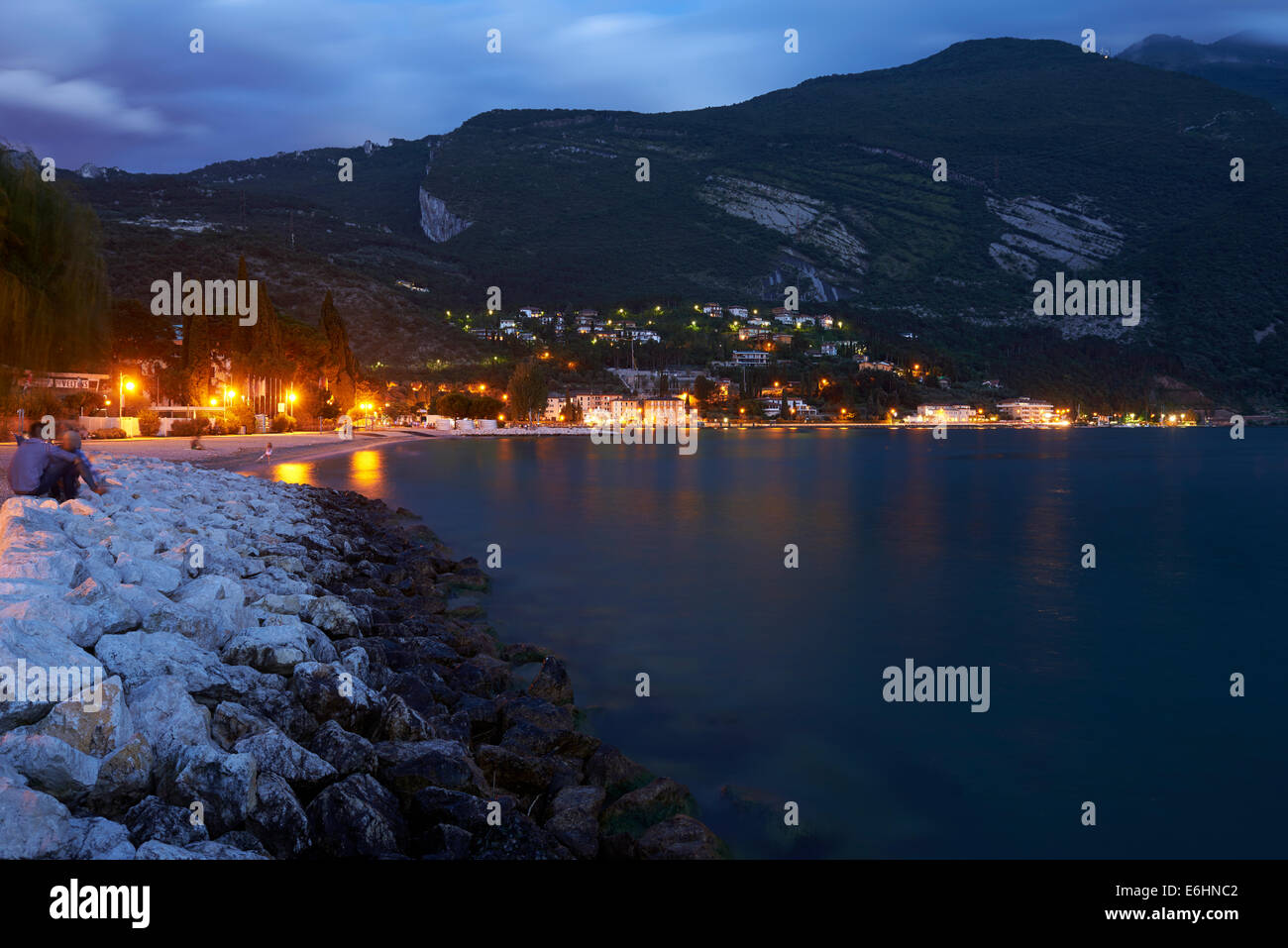 Lago di Garda pebble beach at dusk, Torbole, Lake Garda, Italian Lakes ...