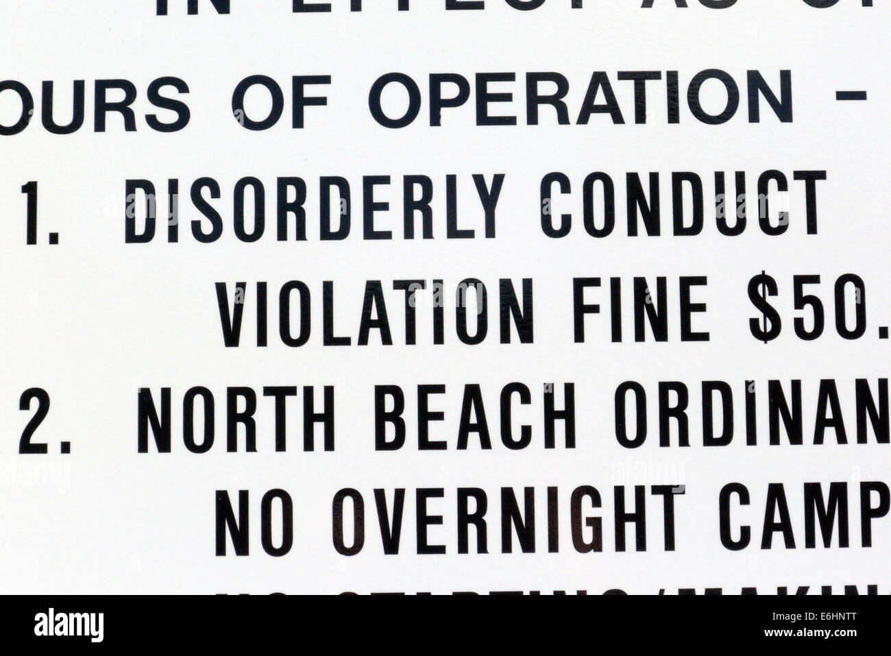A sign warning of a fifty dollar fine for disorderly conduct Stock ...