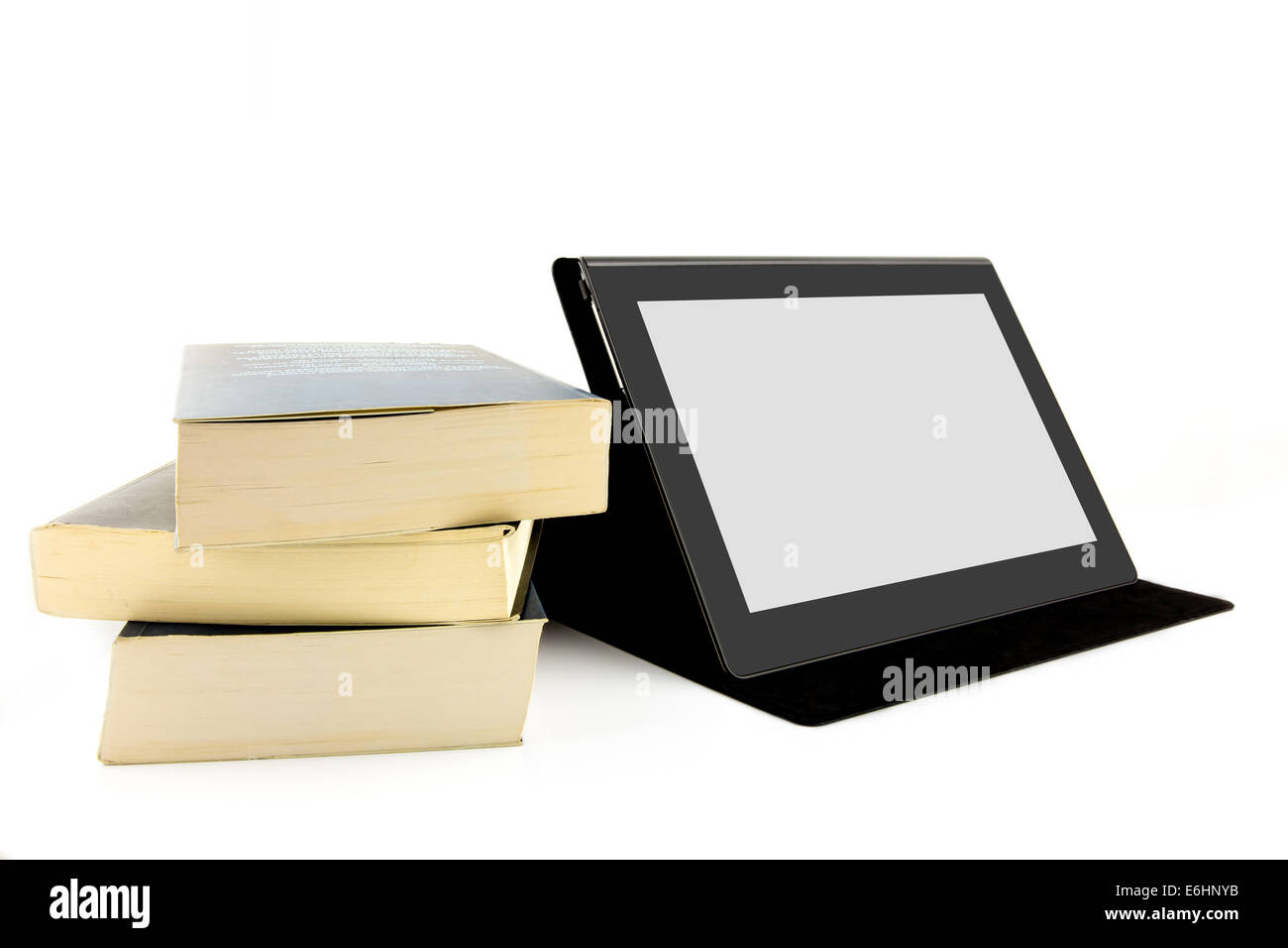 Modern way of reading concept. Books and a tablet device Stock Photo ...