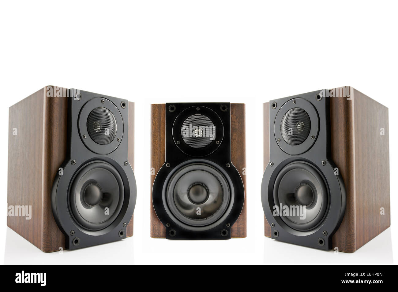 Three modern audio speakers in classic wooden casing isolated on white ...