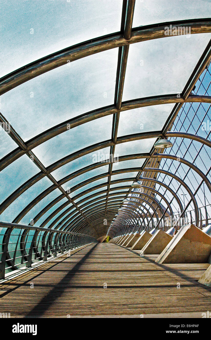 Perspective shot of inerior of glass roofed pedestrian bridge Stock ...