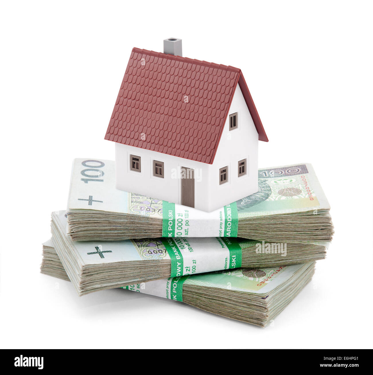House on stack of polish zlotys Stock Photo - Alamy