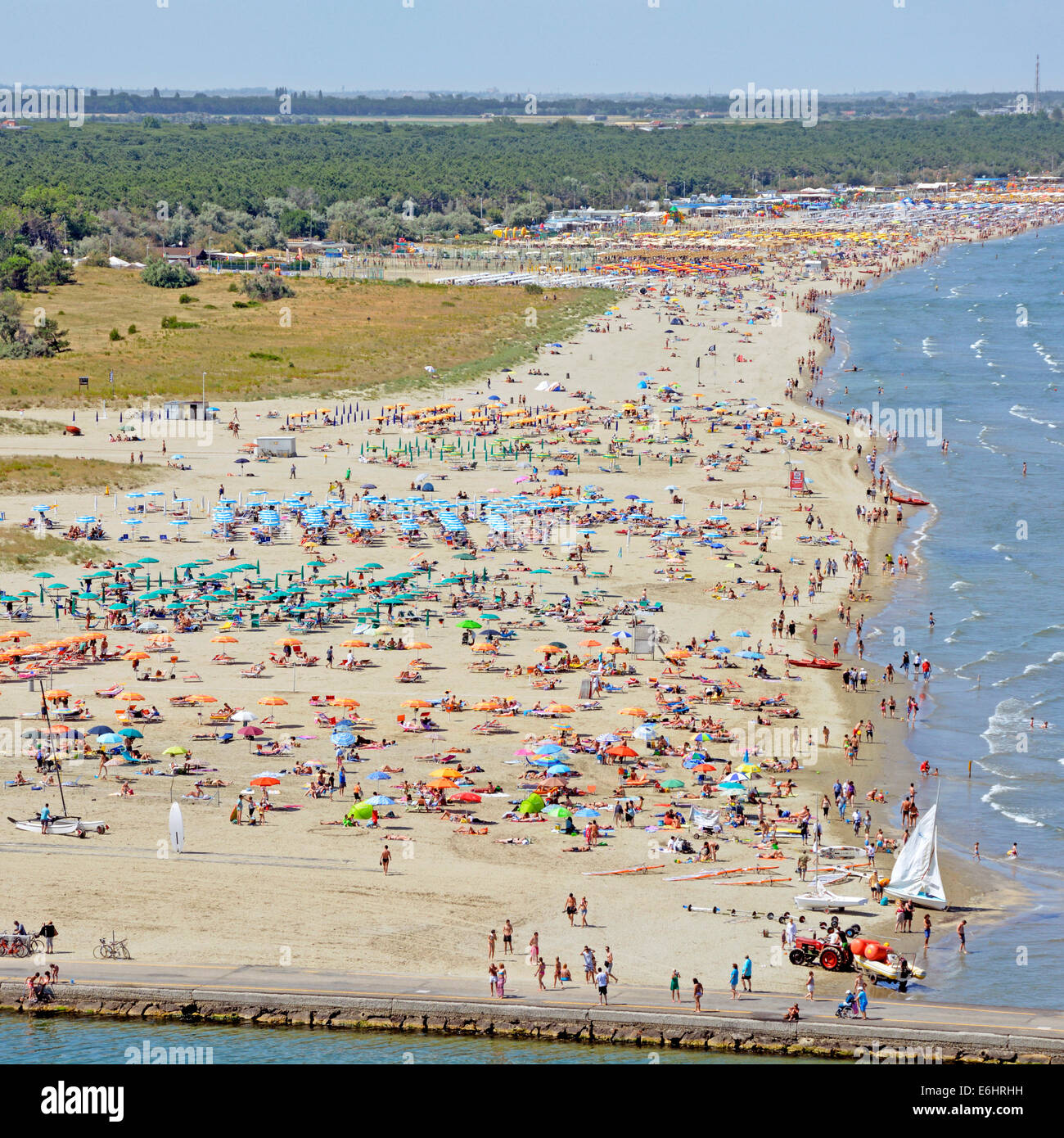 Aerial view of people enjoying long sandy beach along the Adriatic ...