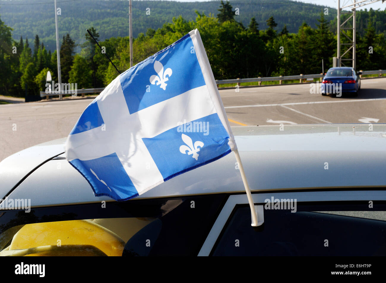 A Quebec flag on a car Stock Photo - Alamy