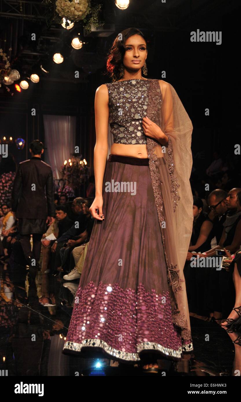 Mumbai, India. 24th Aug, 2014. A model displays the creation of ...