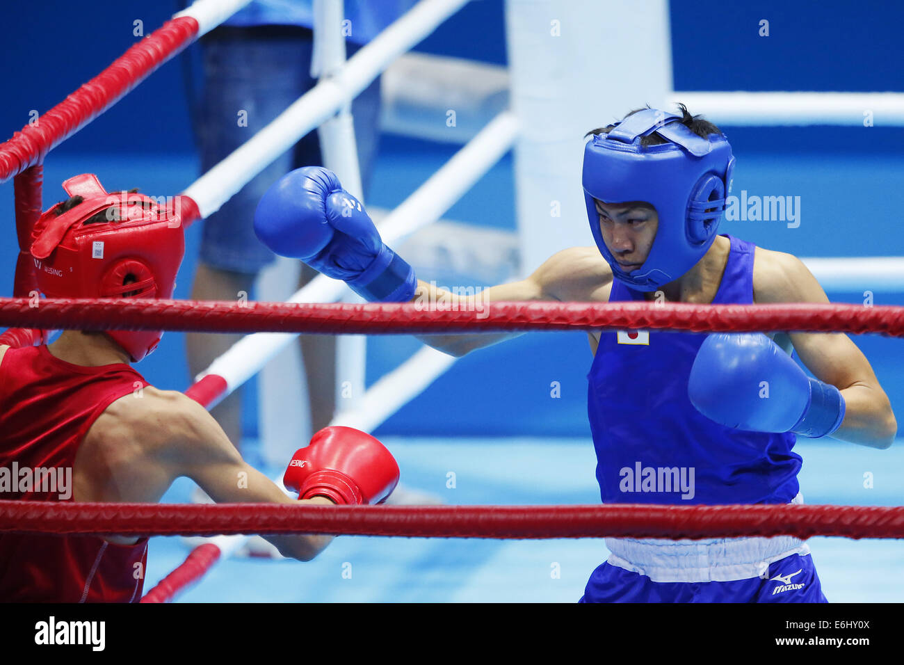 Nanjing, China. 24th Aug, 2014. (L-R) Latipov Sulaymon (UZB), Subaru ...