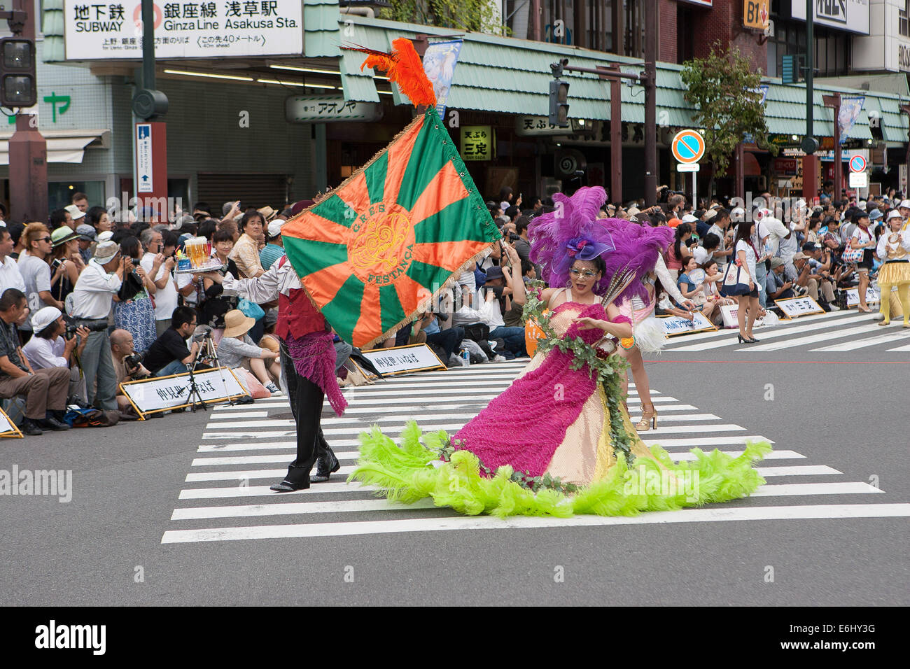 Tokyo, Japan. 23rd Aug, 2014. Samba dancers parade through the streets ...