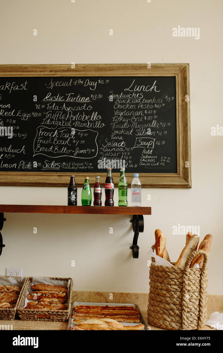 Handwritten chalkboard menu with gold frame at a French bakery and ...