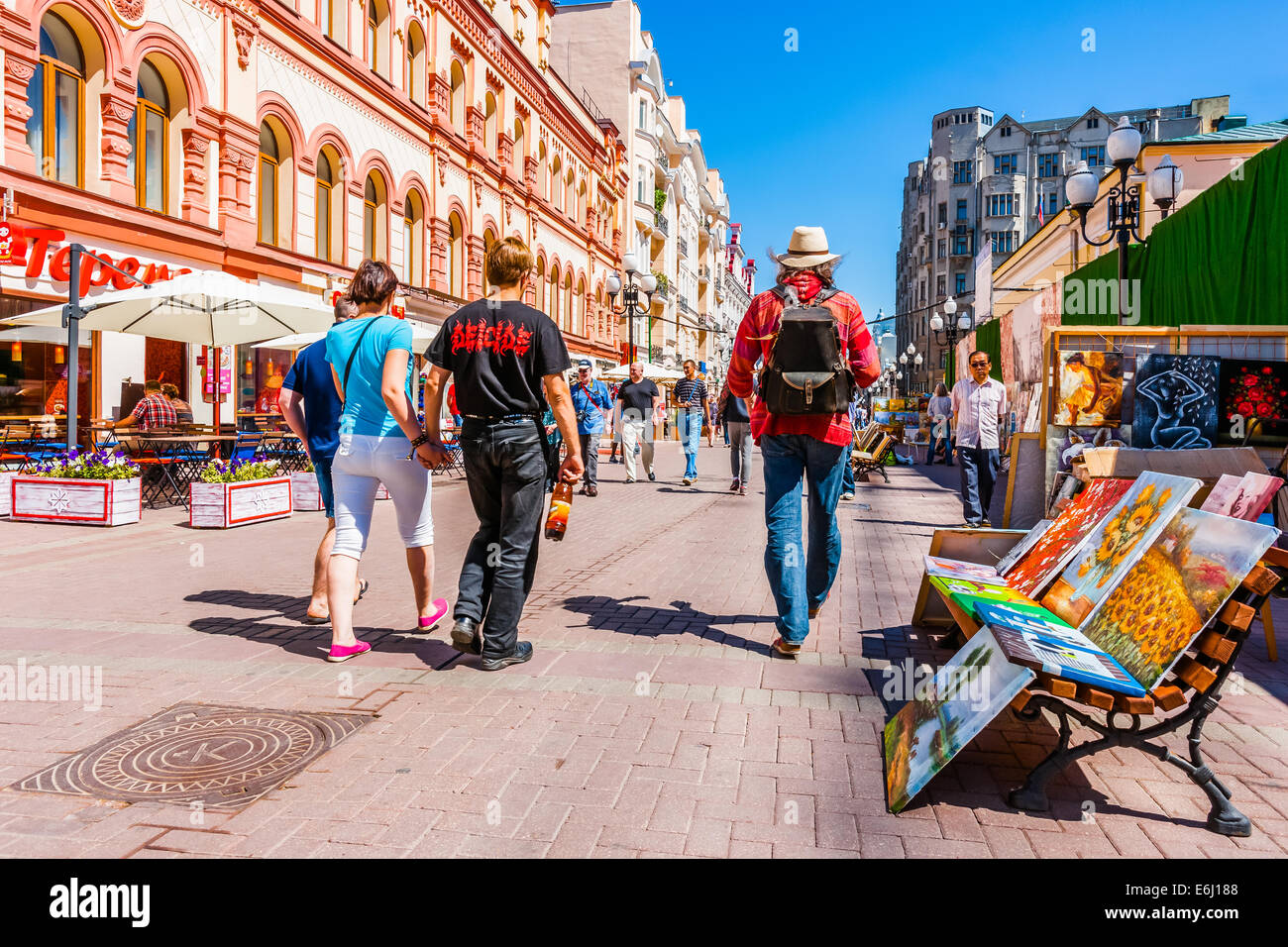 People walk along Arbat street of Moscow from its bottom to its head ...