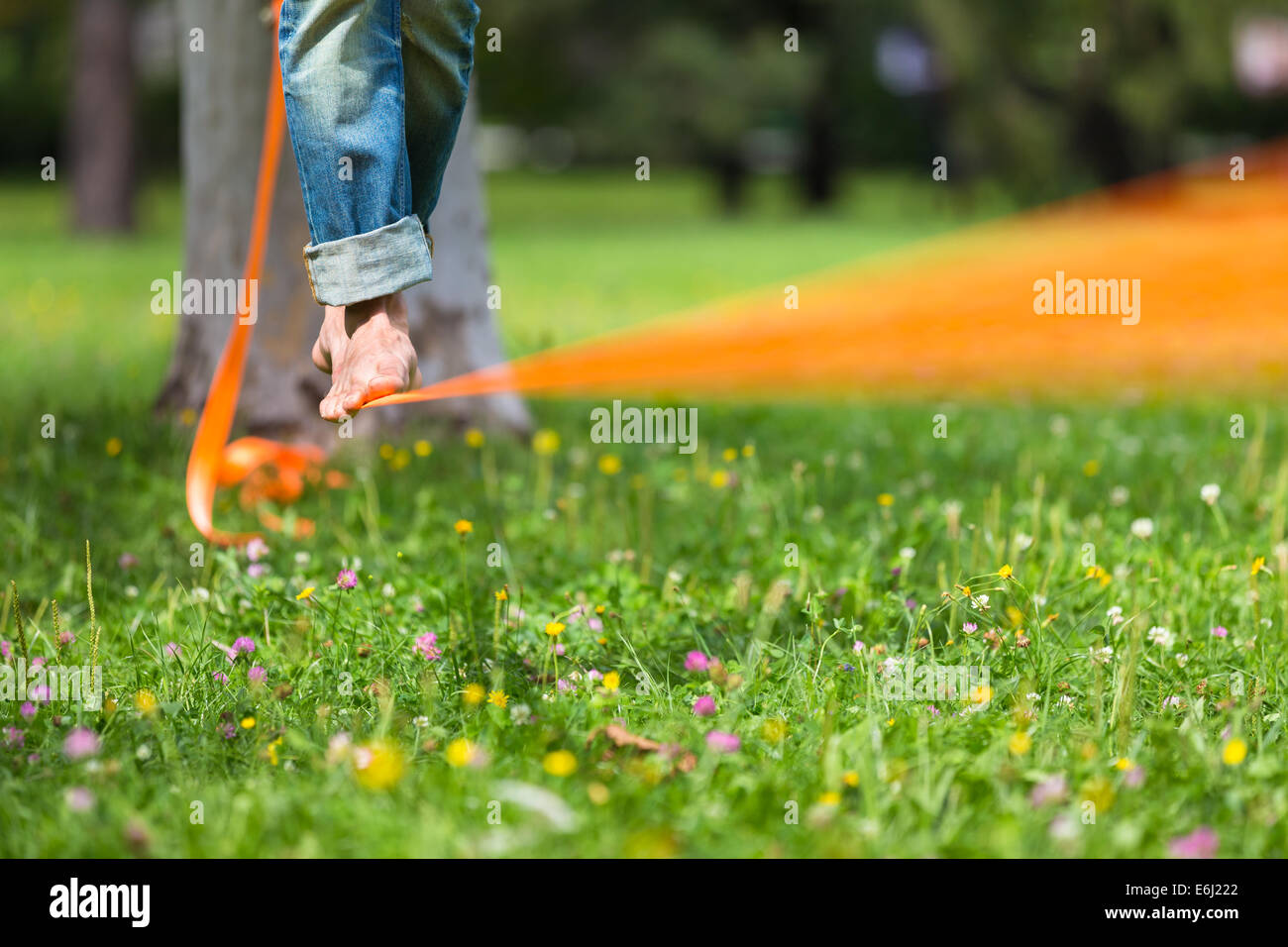 Slack line in the city park Stock Photo - Alamy