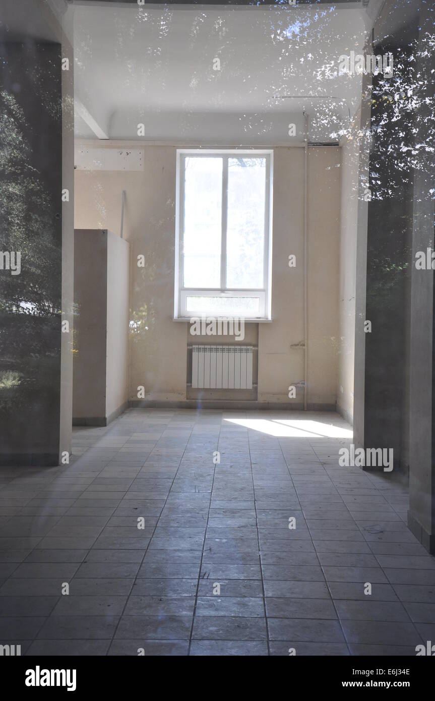 Old empty house seen through the big window Stock Photo - Alamy