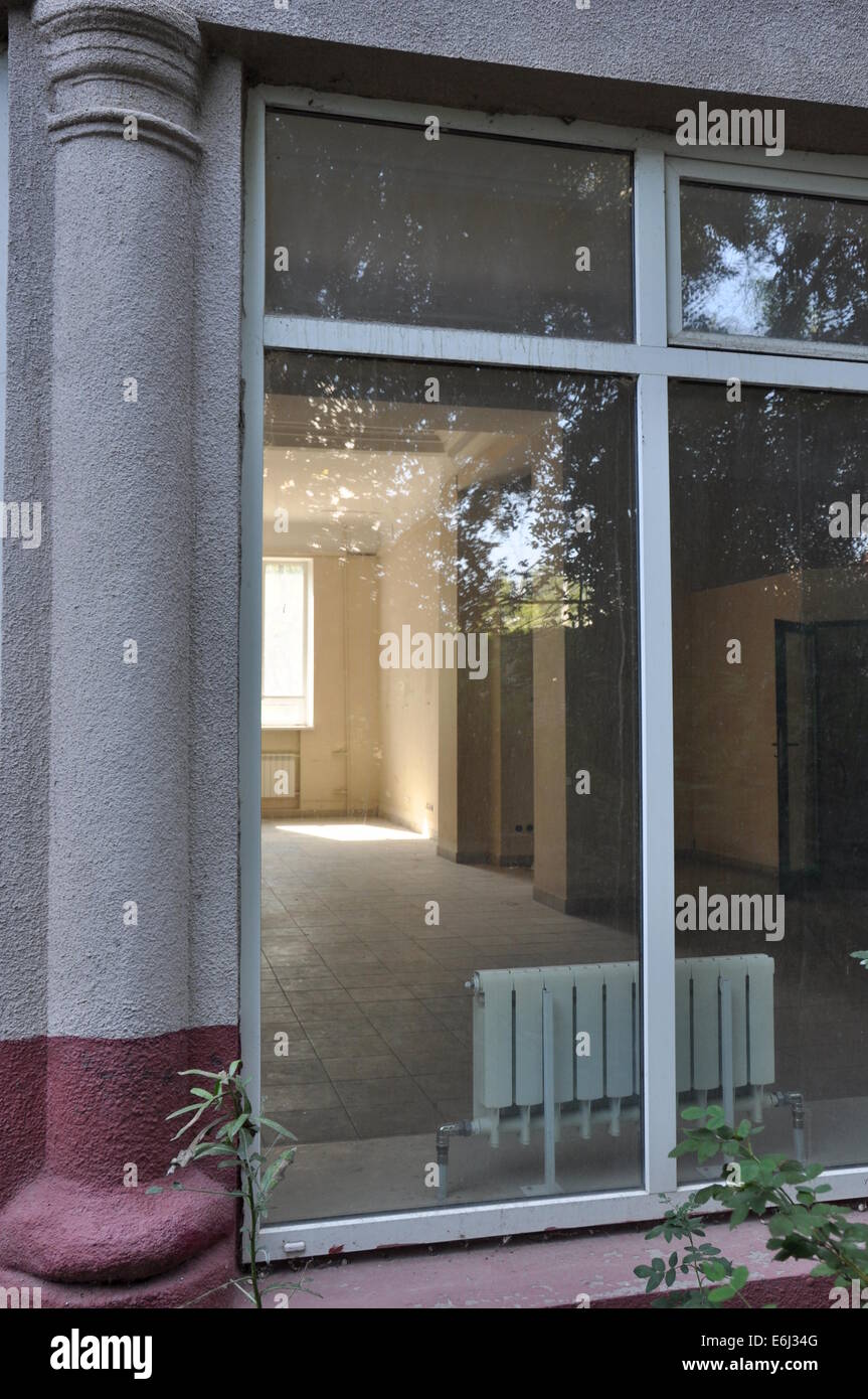 Old empty house seen through the big window Stock Photo - Alamy