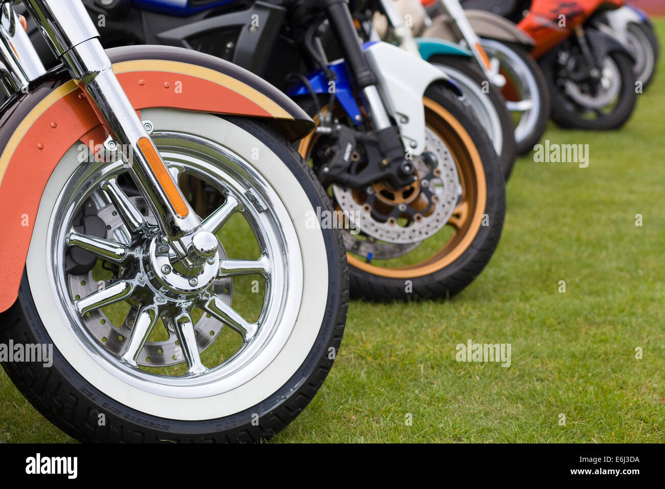 Front wheels of Motorcycles parked up for a show in England Stock Photo ...
