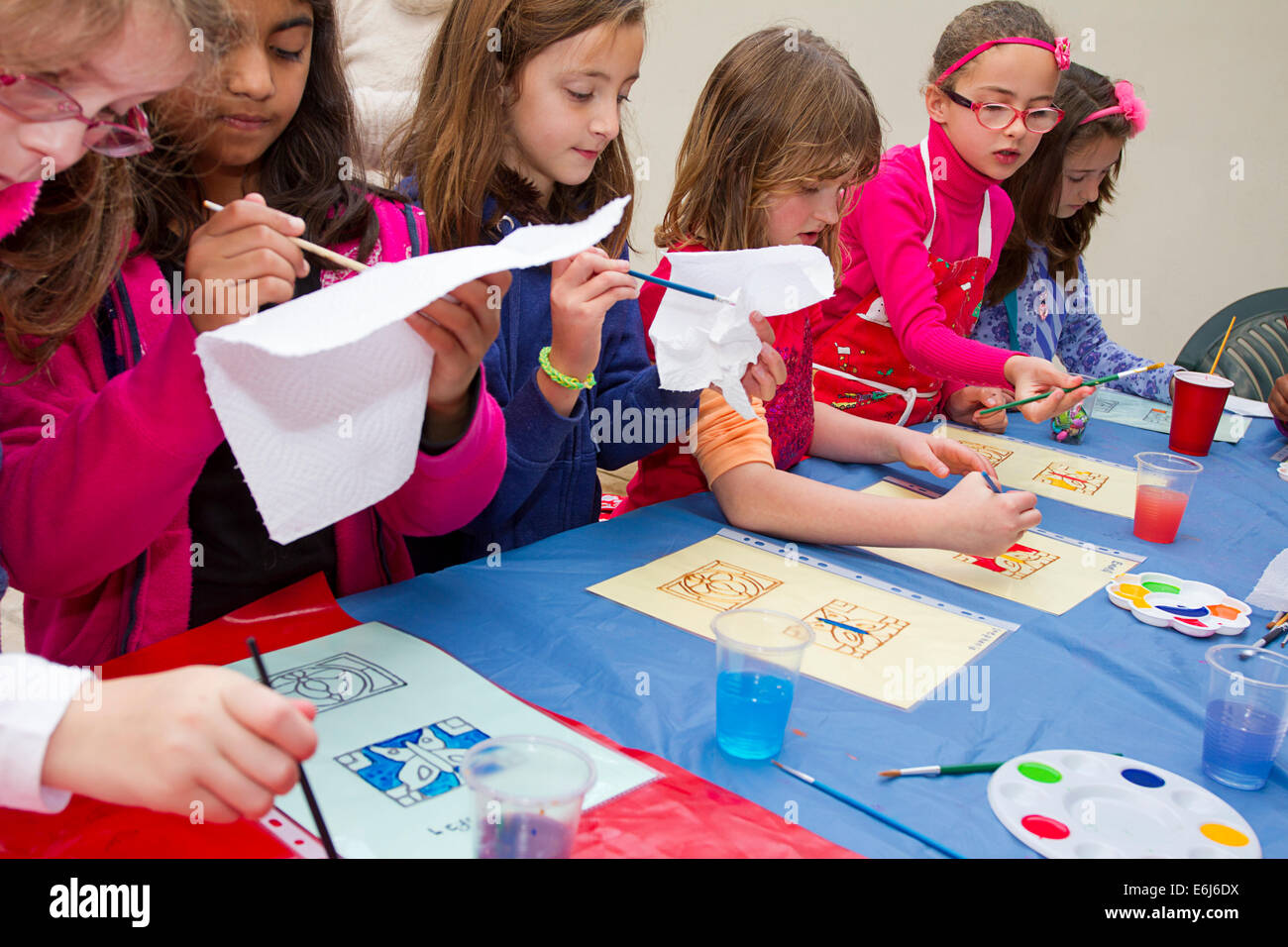 Pretty girls painting together Stock Photo - Alamy