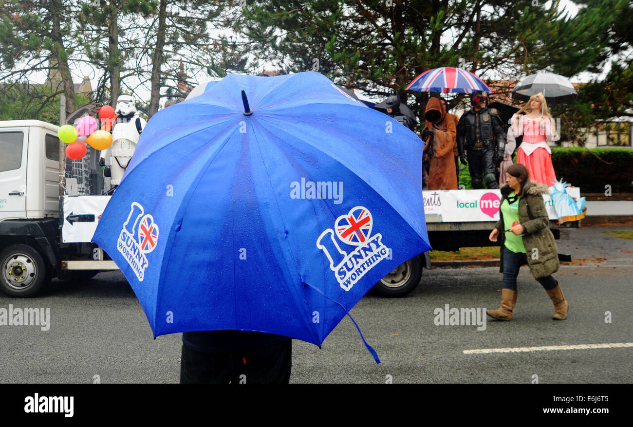 An optimistic umbrella with the logo 'I Love Sunny Worthing' at the ...
