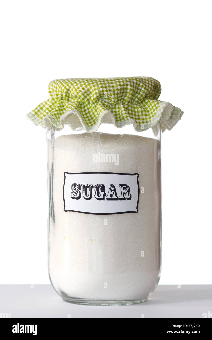 A jar of sugar isolated on white background Stock Photo - Alamy