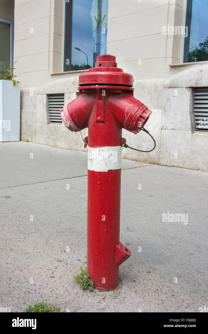 Fire hydrant with two hose outlet on an urban street Stock Photo - Alamy