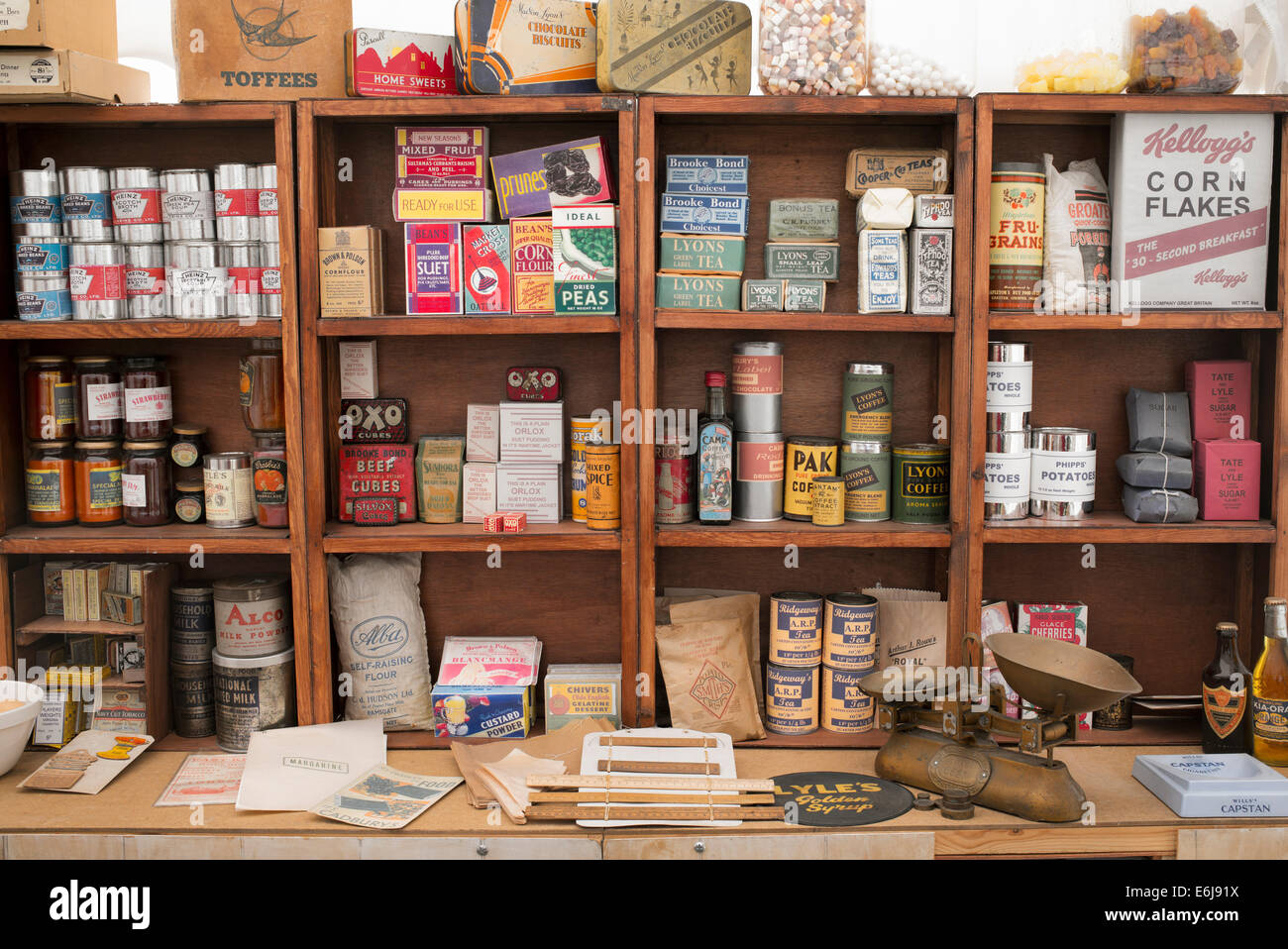 1940s replica grocers shop with packets of food and household items ...