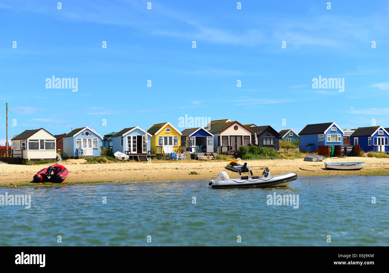 Colored houses on the beach and pontoon Stock Photo - Alamy