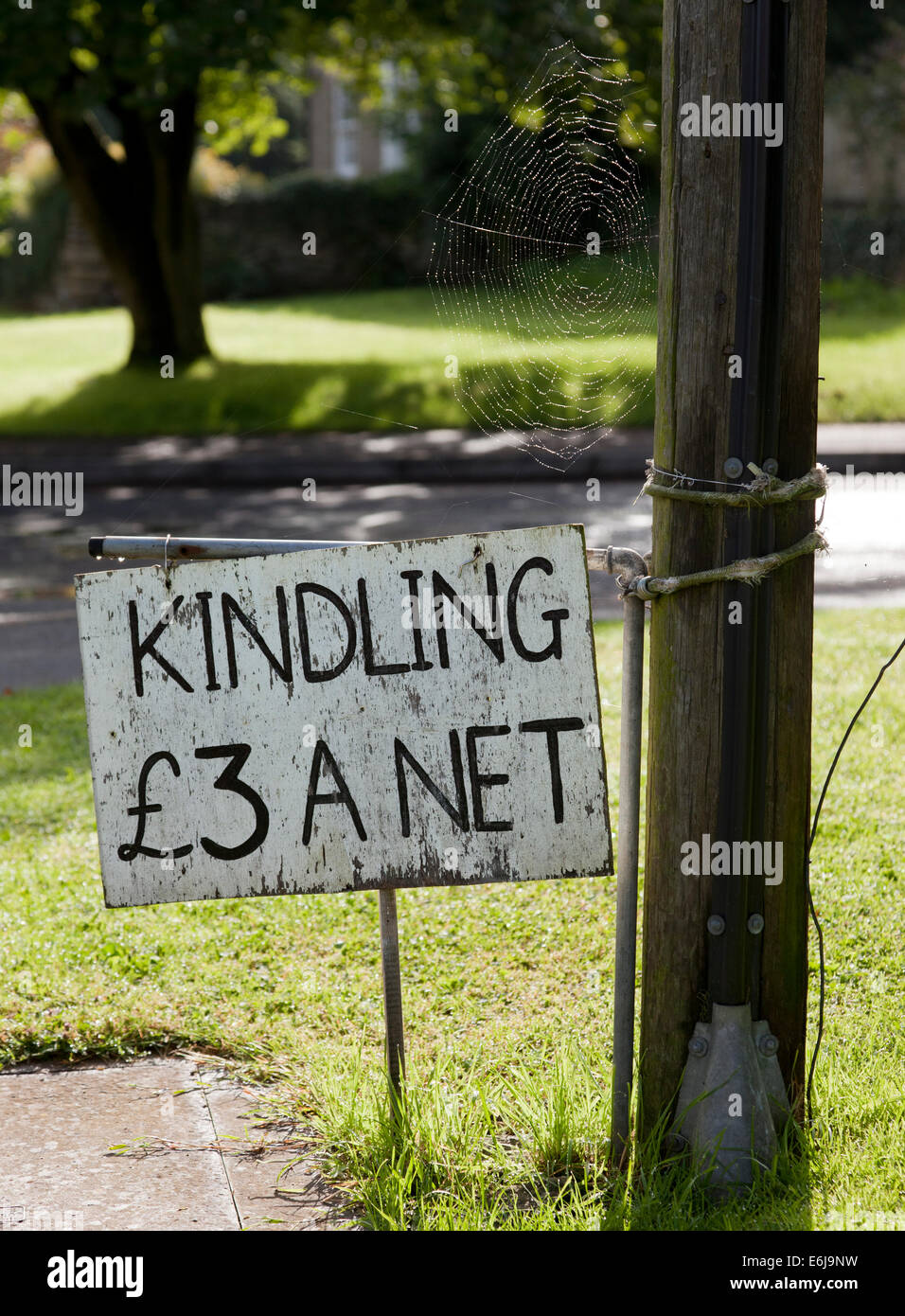 A quaint village roadside sign advertising kindling firewood Stock ...