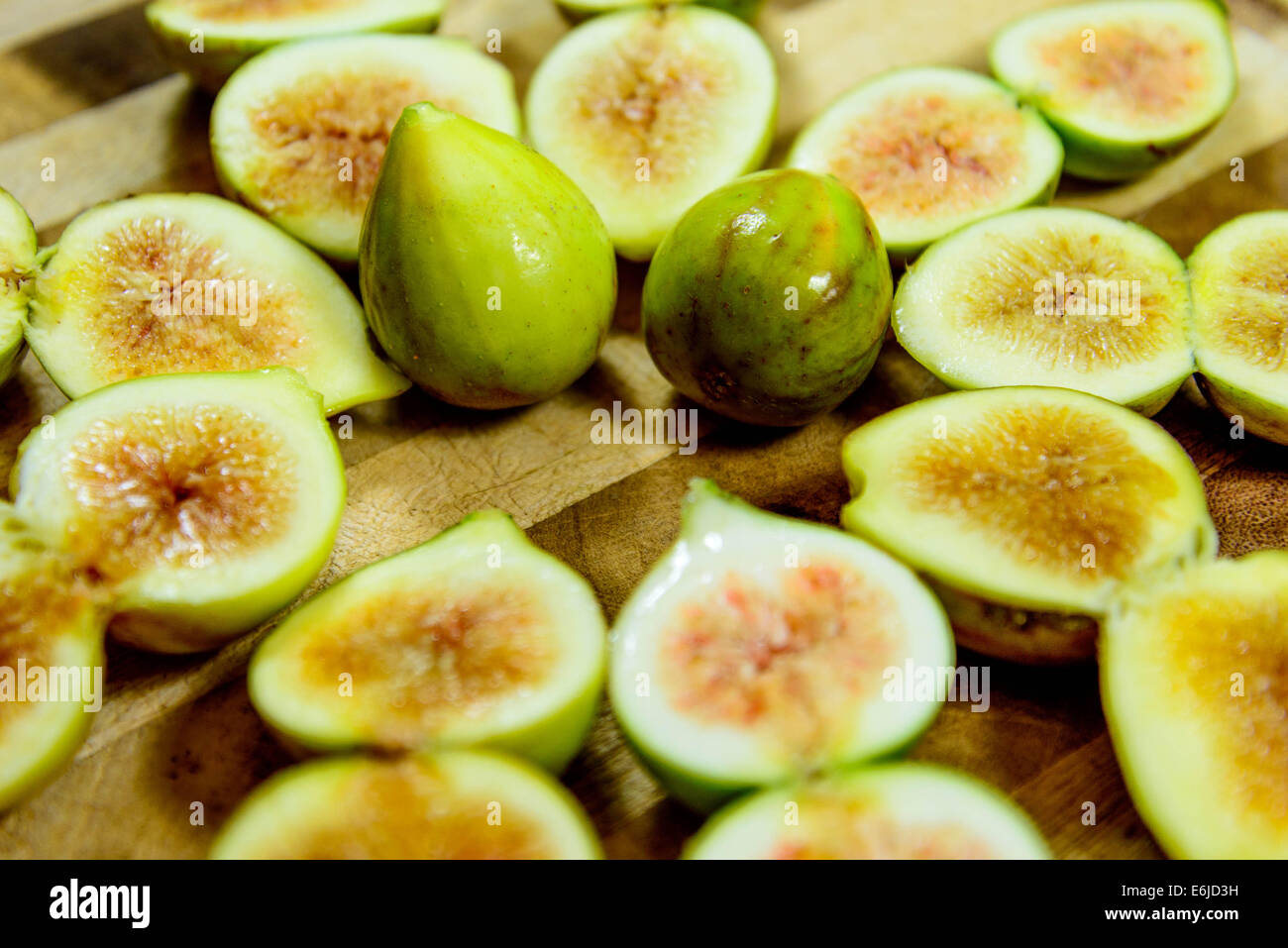sliced green ripe figs ready to eat Stock Photo - Alamy