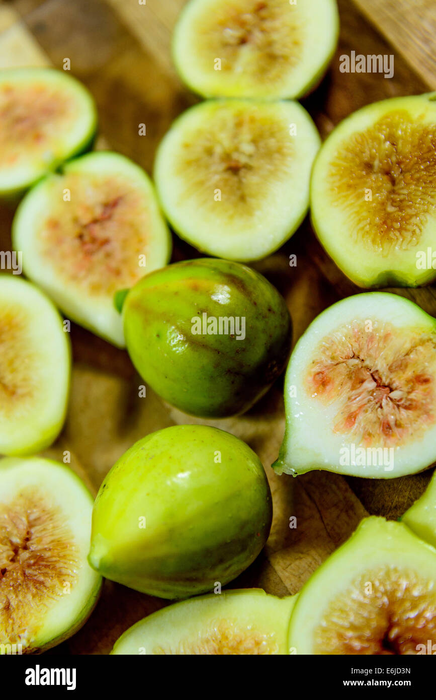 sliced green ripe figs ready to eat Stock Photo - Alamy