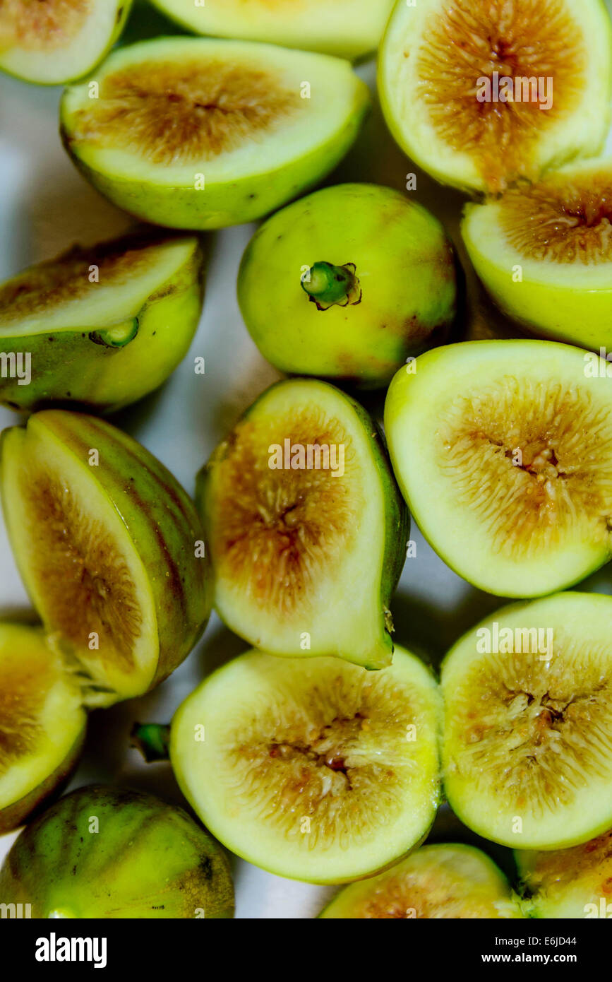sliced green ripe figs ready to eat Stock Photo - Alamy