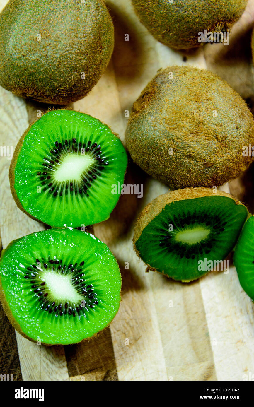 sliced green ripe kiwi ready to eat Stock Photo - Alamy