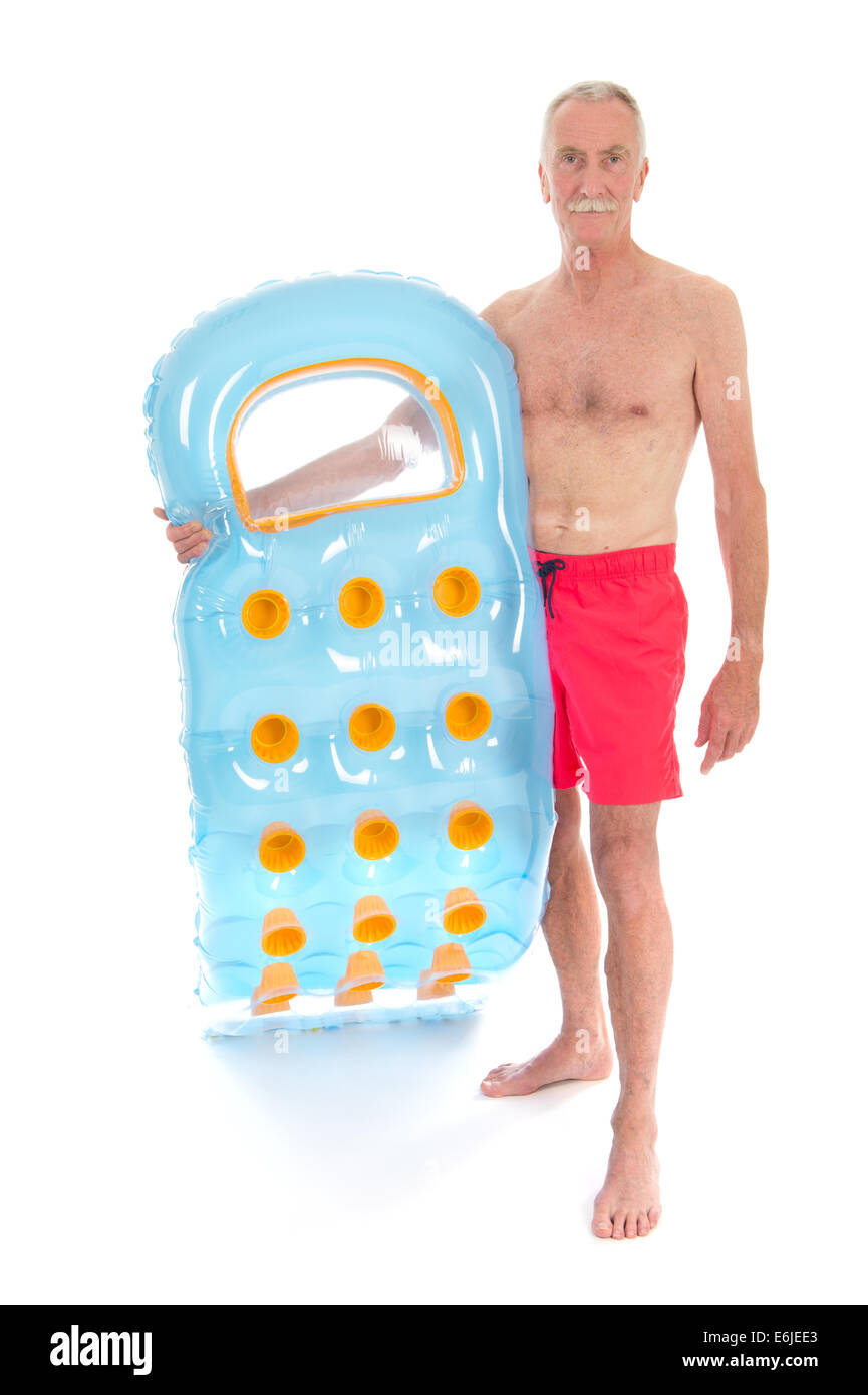 Retired man on vacation with inflatable mattress isolated over white ...