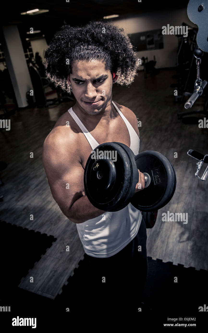 young man at workout in a gym Stock Photo - Alamy