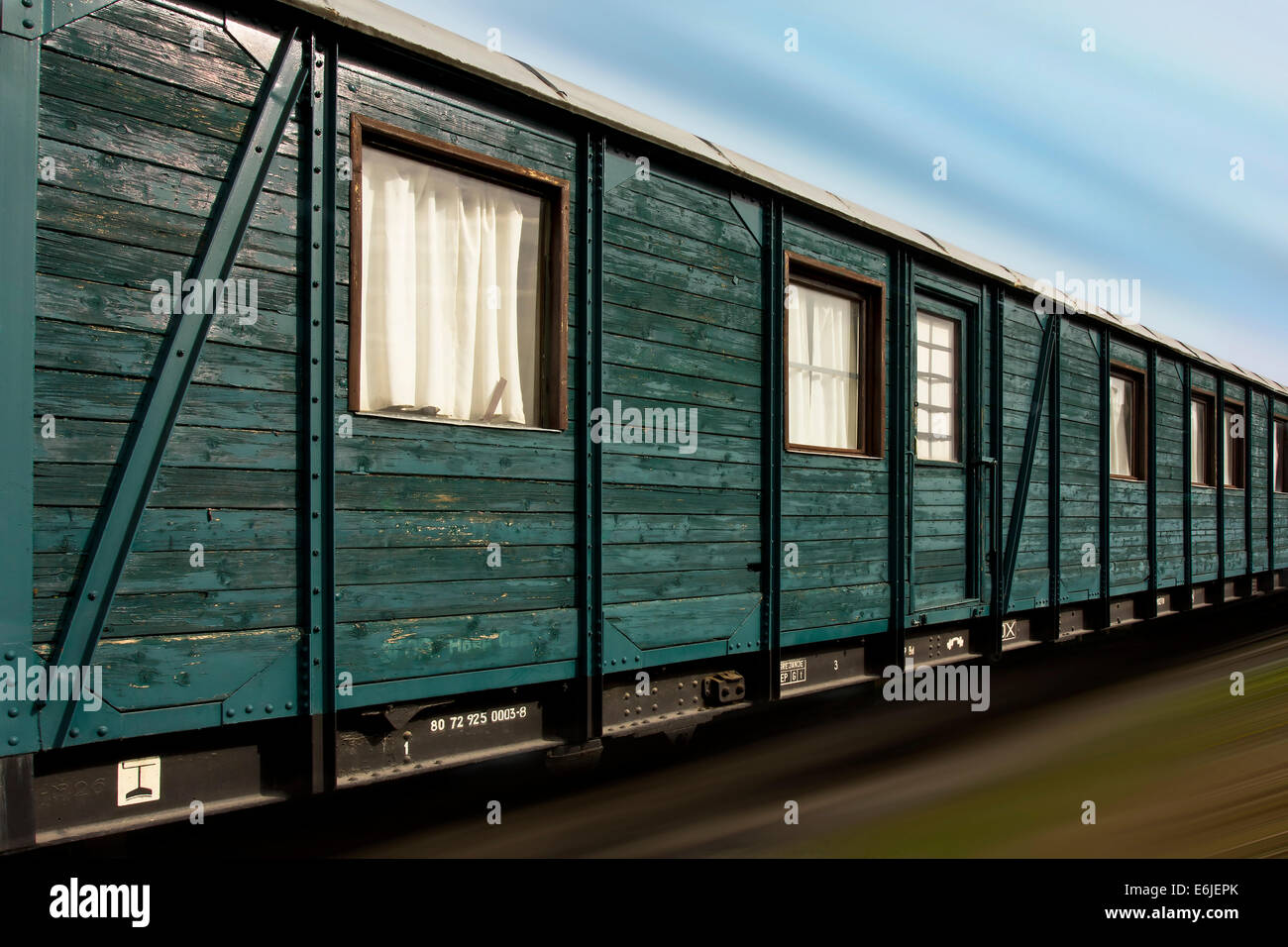 Old train carriages in motion Stock Photo - Alamy