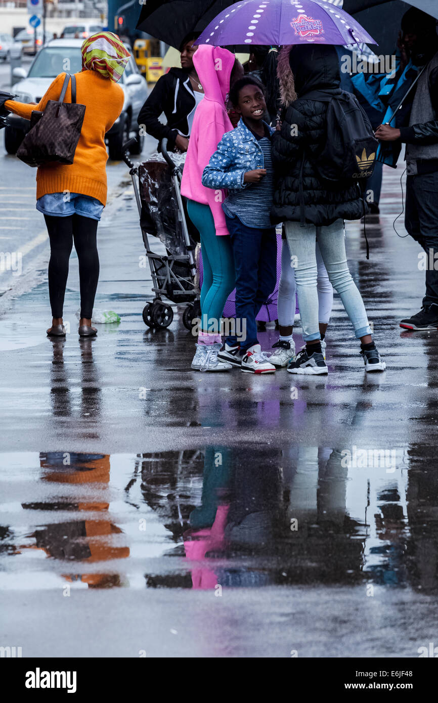 People Walking in the Rain at Southend on a Very Wet August Bank ...