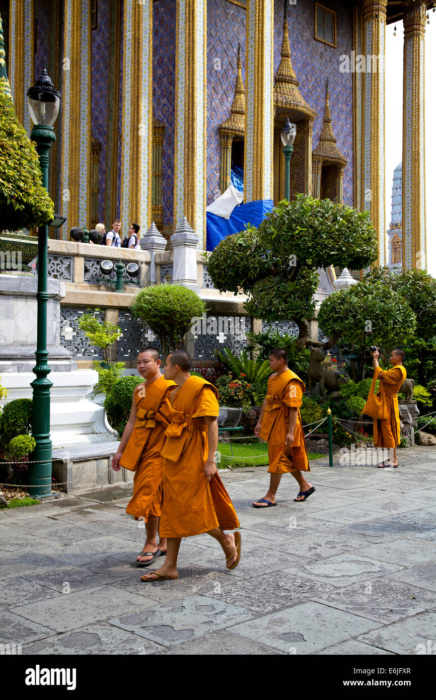 Buddhist monks at Grand Palace, building in Bangkok, Thailand ...