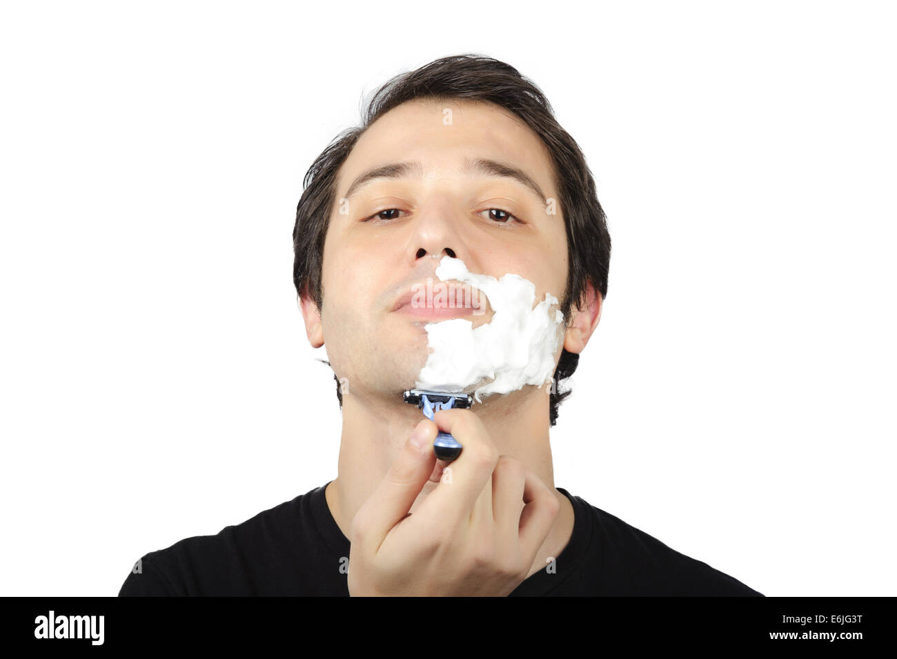 portrait og young man shaving himself Stock Photo - Alamy