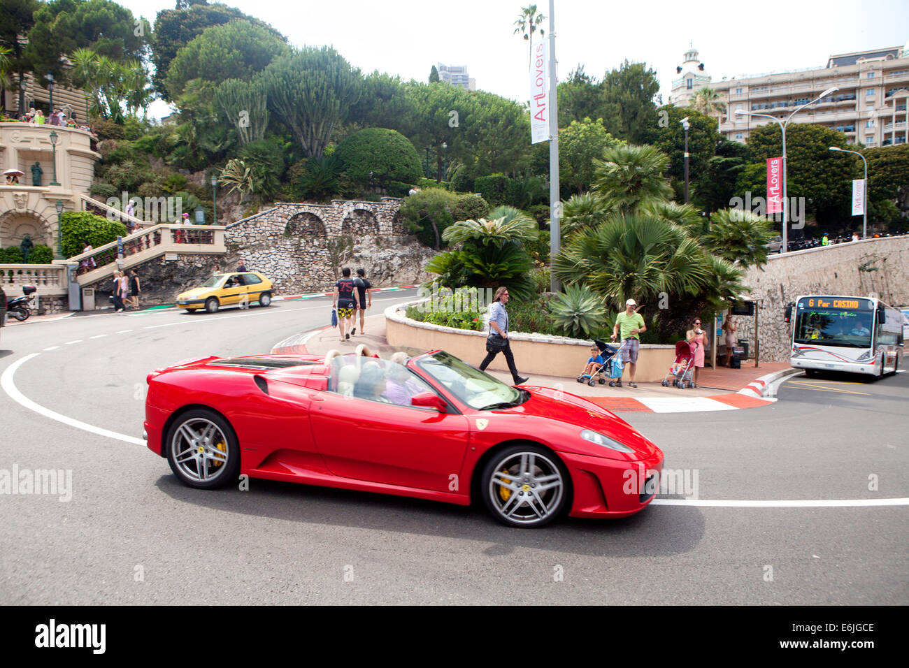 Red Ferrari F430 driving round the Fairmont Hairpin in Monte Carlo an ...