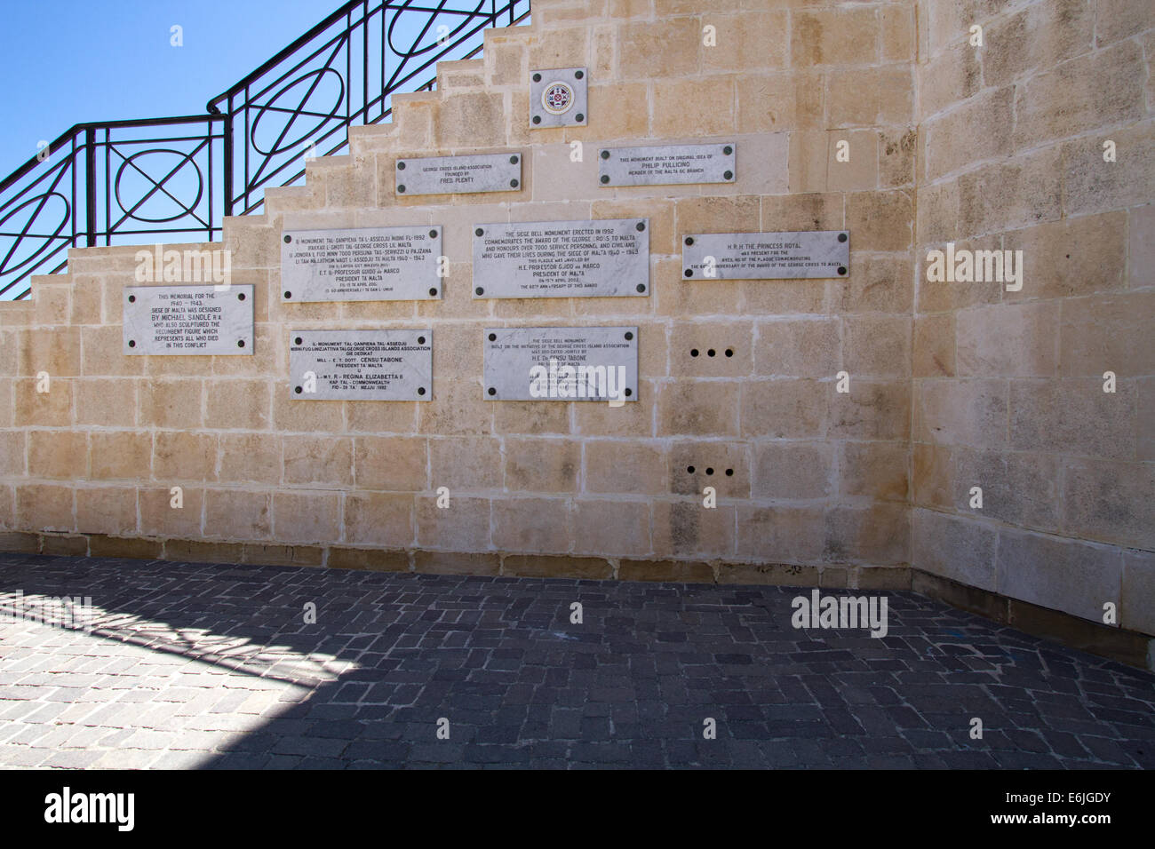 Plaques on siege bell memorial Stock Photo - Alamy