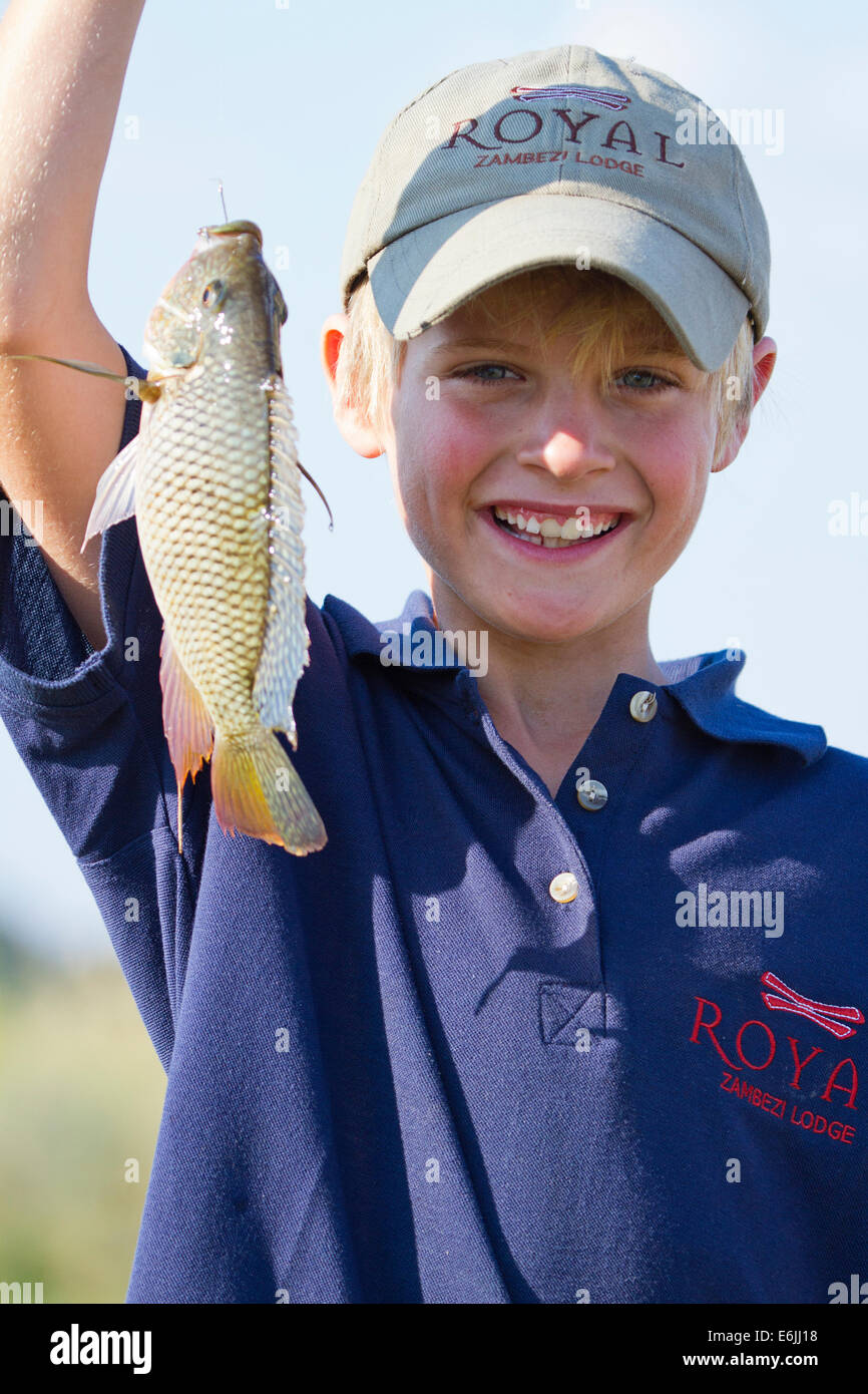 Boy fish fishing hi-res stock photography and images - Alamy