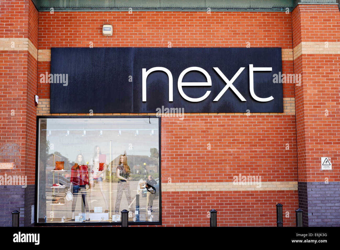 Sign outside a branch of NEXT Stock Photo - Alamy