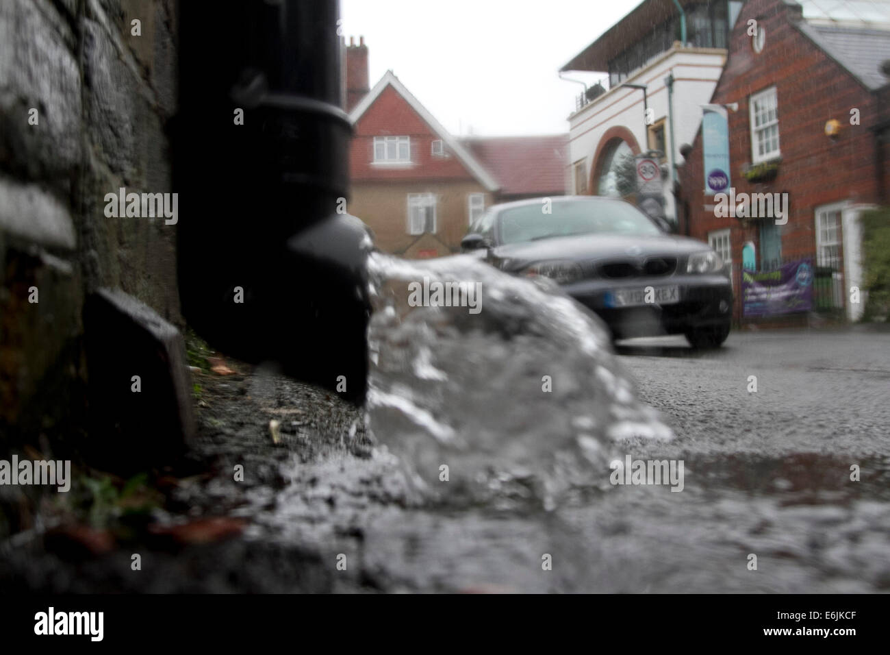 Rain water gushing from drain hi-res stock photography and images - Alamy