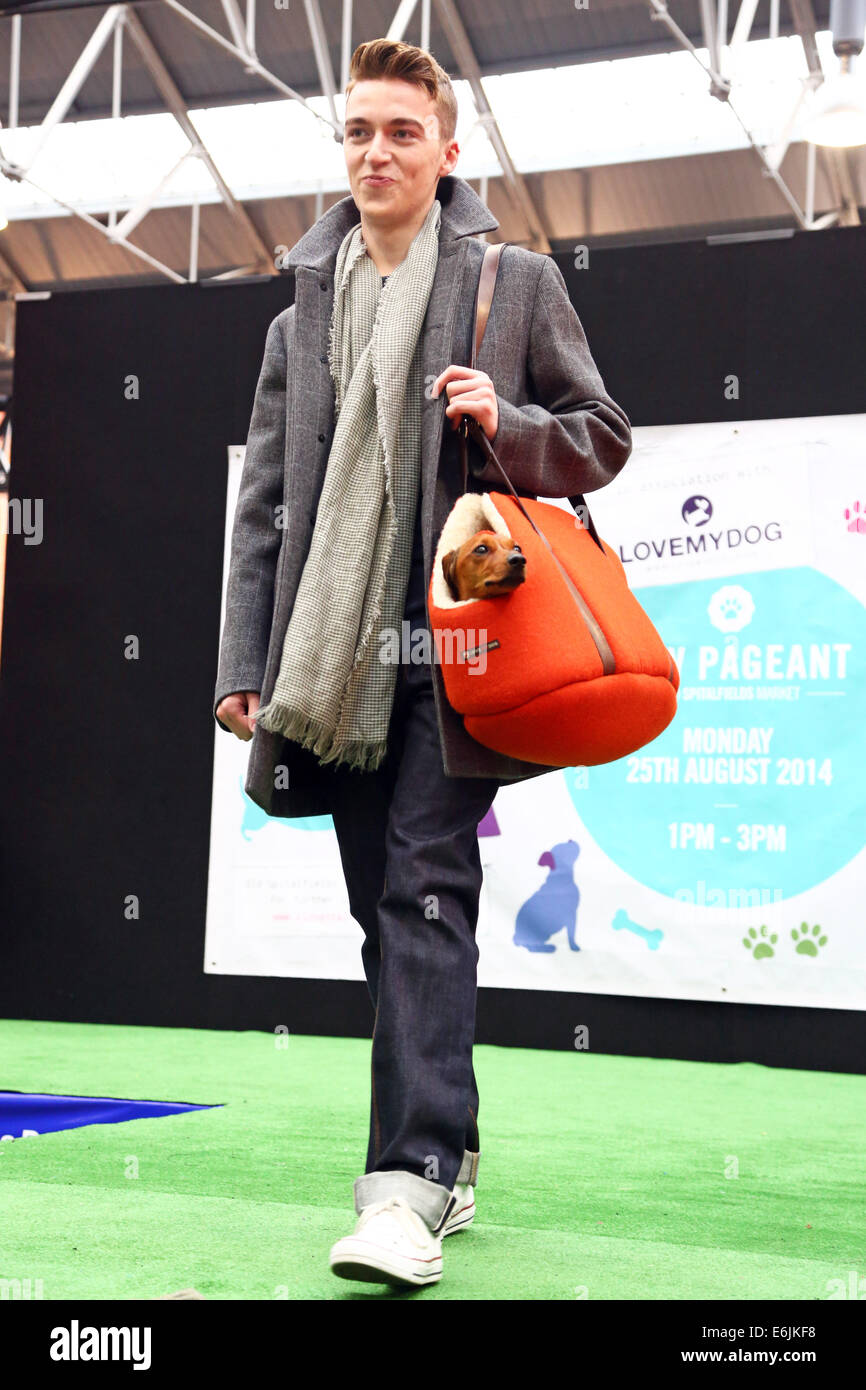 London, UK. 25th August 2014. Dogs taking part in the canine fashion ...