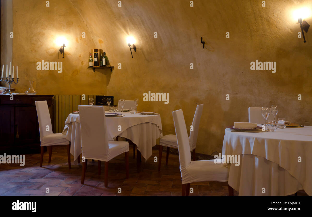 Set tables in classy restaurant in Italy. Lombardy Stock Photo - Alamy