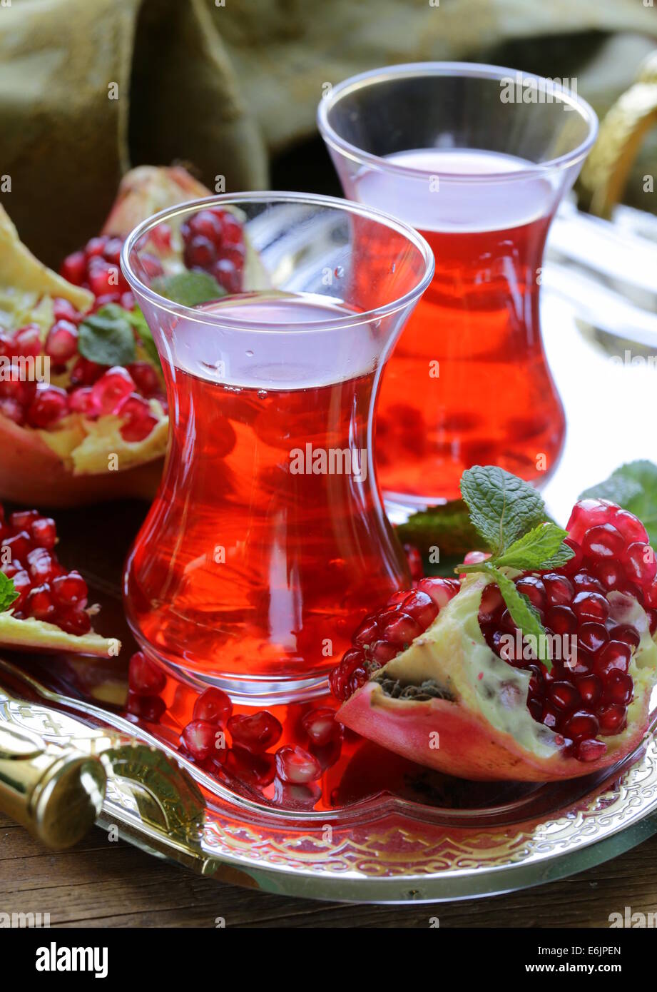 pomegranate fruit tea in traditional glass cups Stock Photo - Alamy