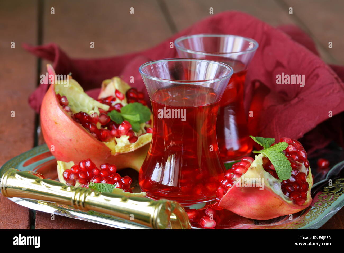 pomegranate fruit tea in traditional glass cups Stock Photo - Alamy