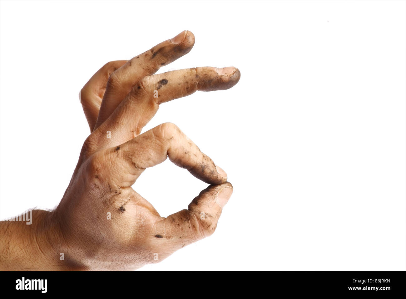 A dirty hand showing the OK sign Stock Photo - Alamy